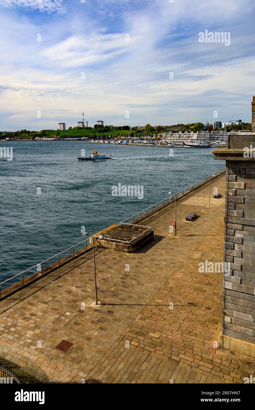 The Cremyll Ferry makes its way past Royal William Yard, a former Royal ...