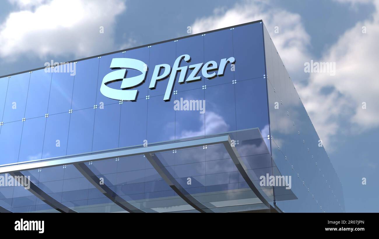 Pfizer Showcasing a glass building with a recognizable corporate logo ...