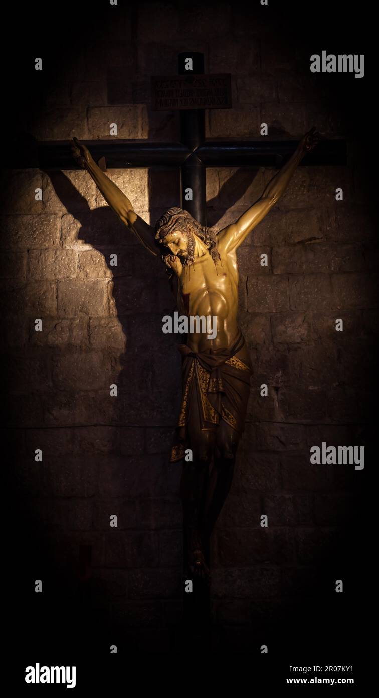 Old medieval crucifix in Italian church - made of wood Stock Photo - Alamy