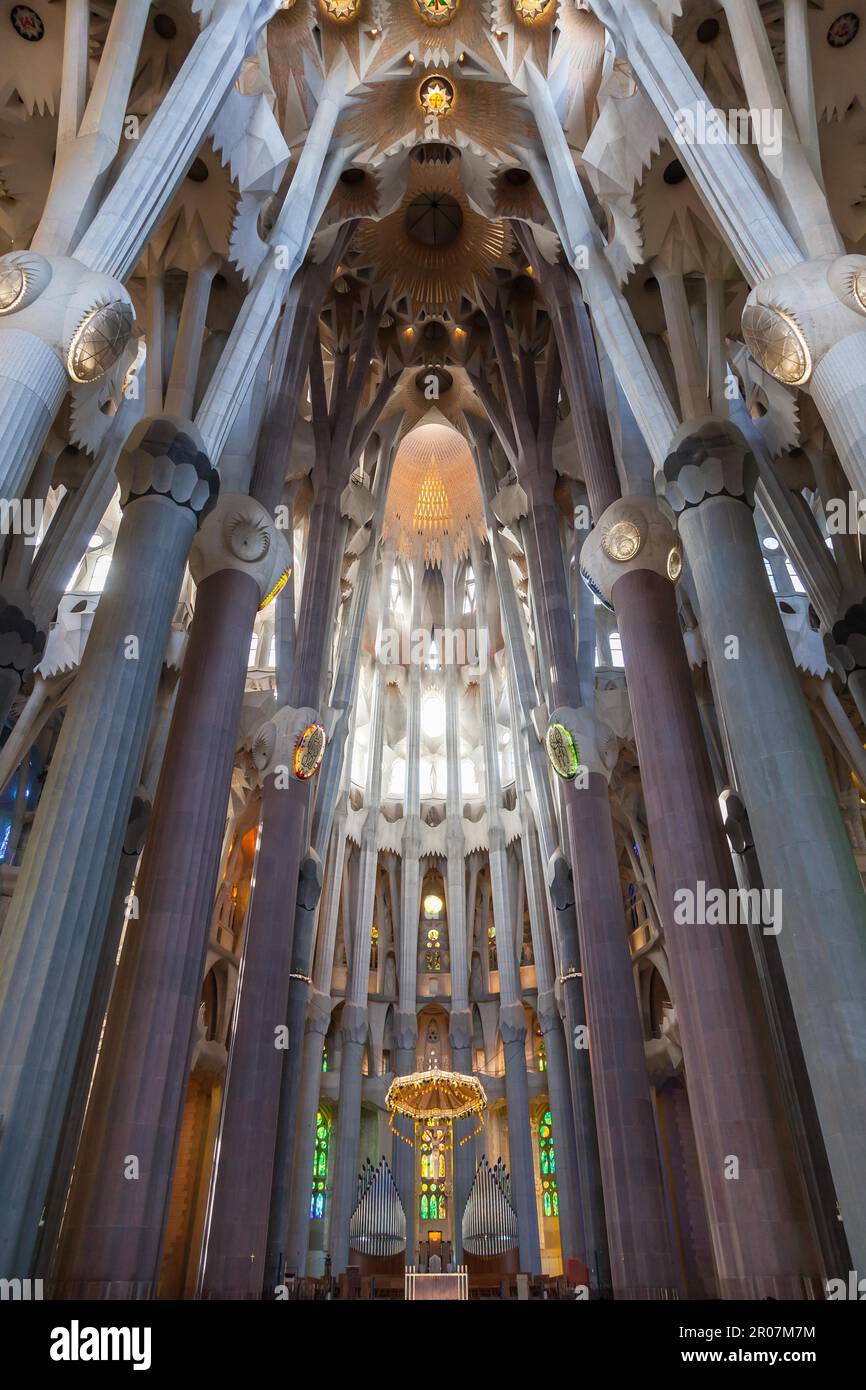 The sun shines through the stained glass windows of Gaudis masterpiece ...