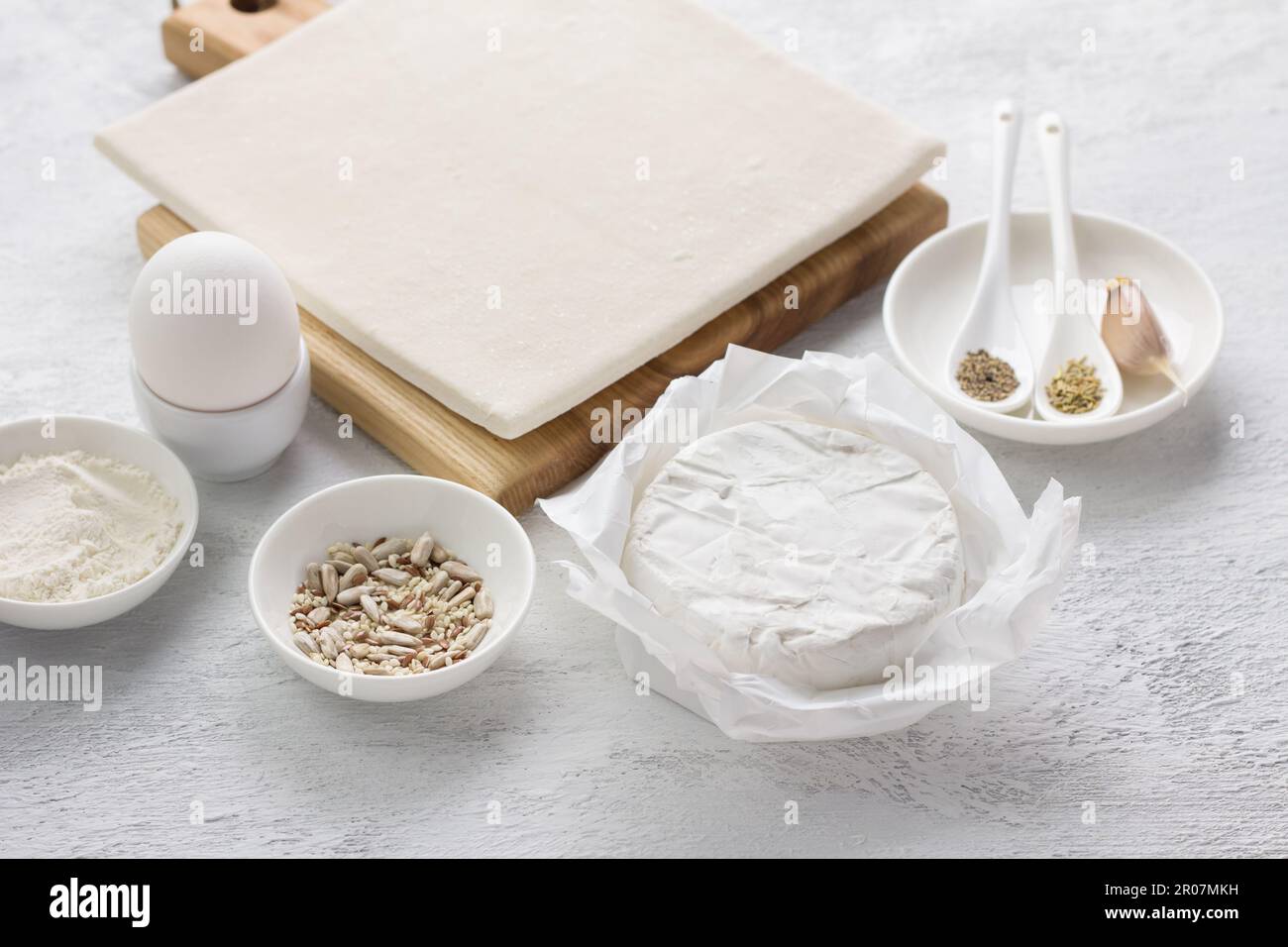 Ingredients for a delicious homemade pie or snack: puff pastry, white ...