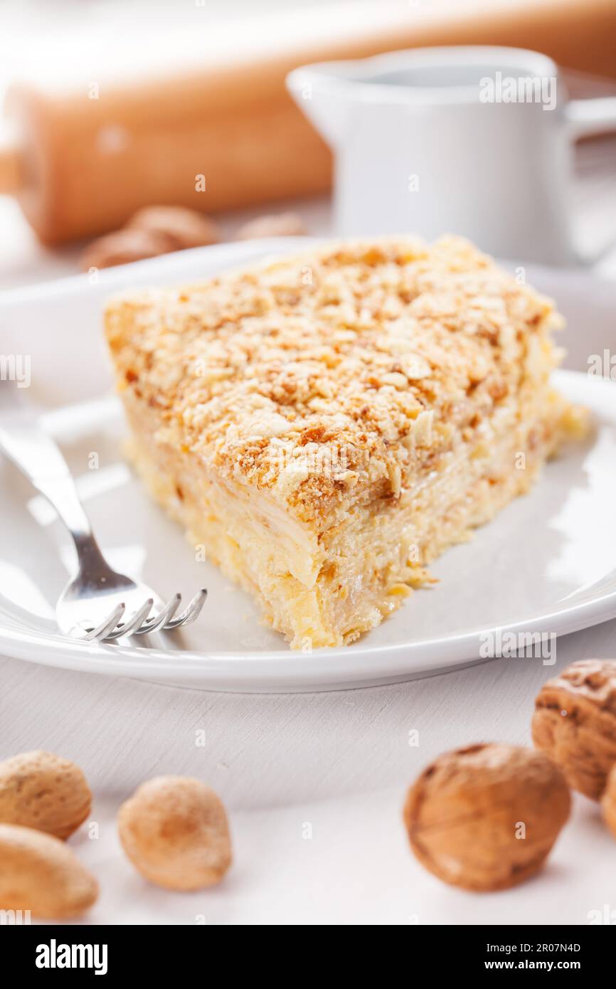 Traditional Russian pancakes pie with nuts and baking ingredients Stock ...