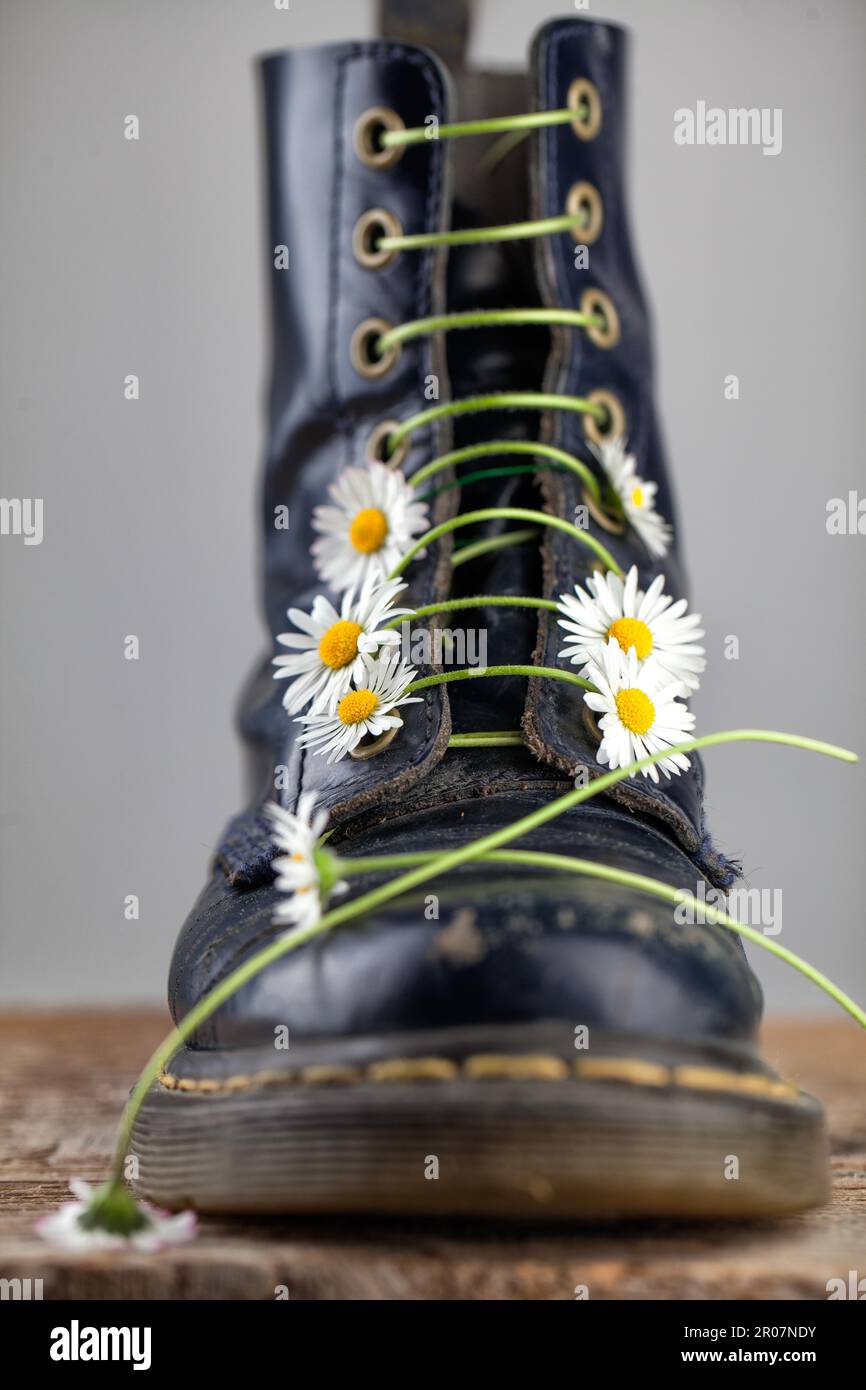 Ladies Heavy Black Daisy Boots Stock Photo - Alamy