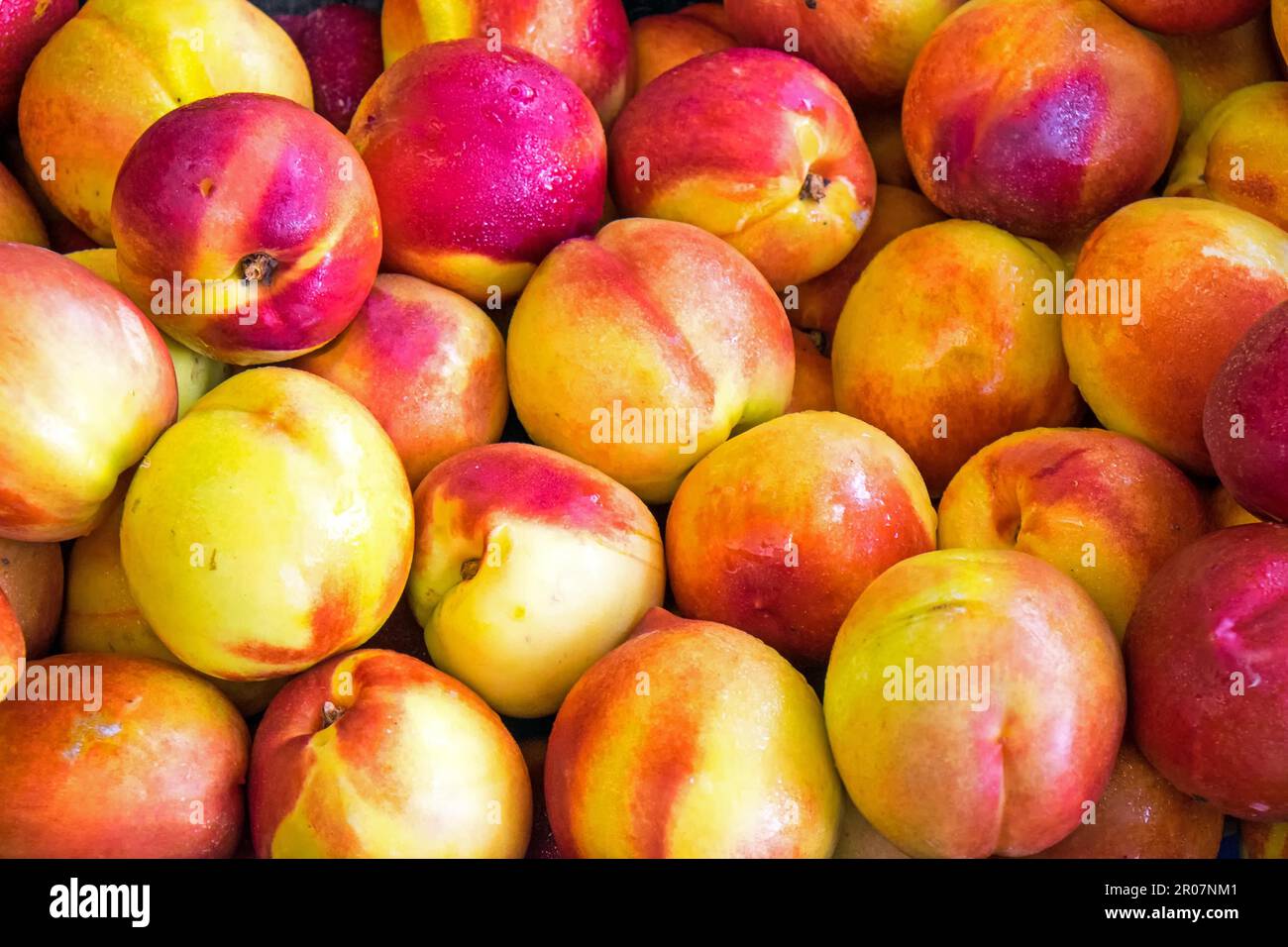 Background from fresh nectarines on the market Stock Photo - Alamy