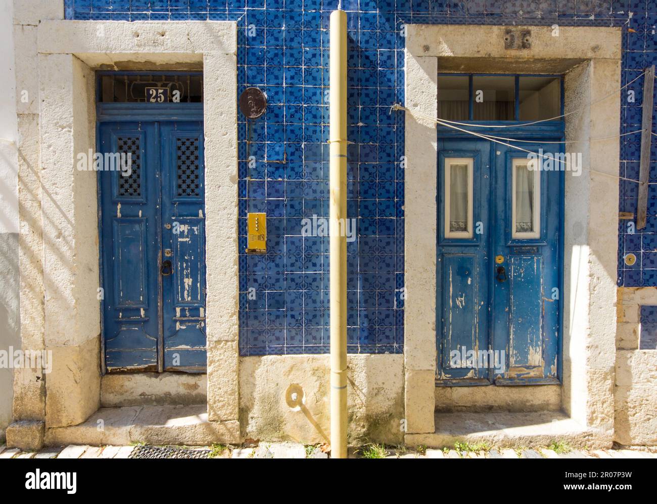 Two blue doors in the Alfama district in Lisbon Stock Photo - Alamy
