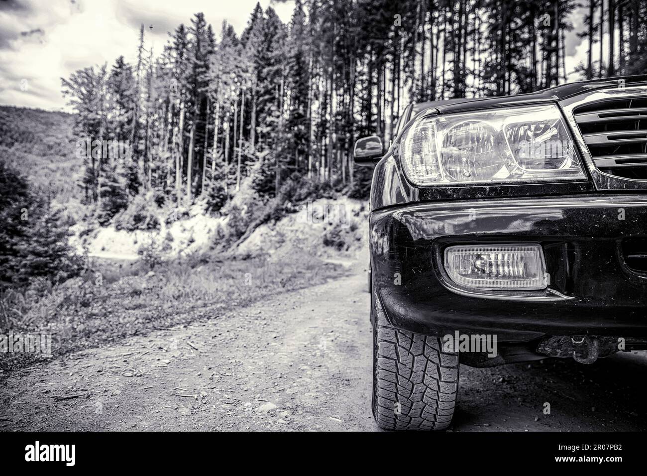 Off-road travel on mountain road. Travel concept with big car . Closeup ...