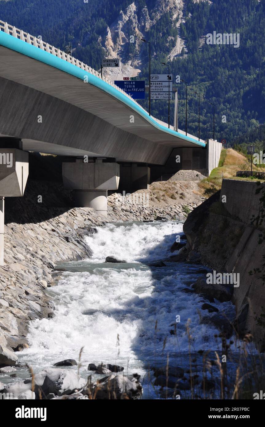 Maurienne motorway crossing a mountain the Arc river in Savoie Stock ...