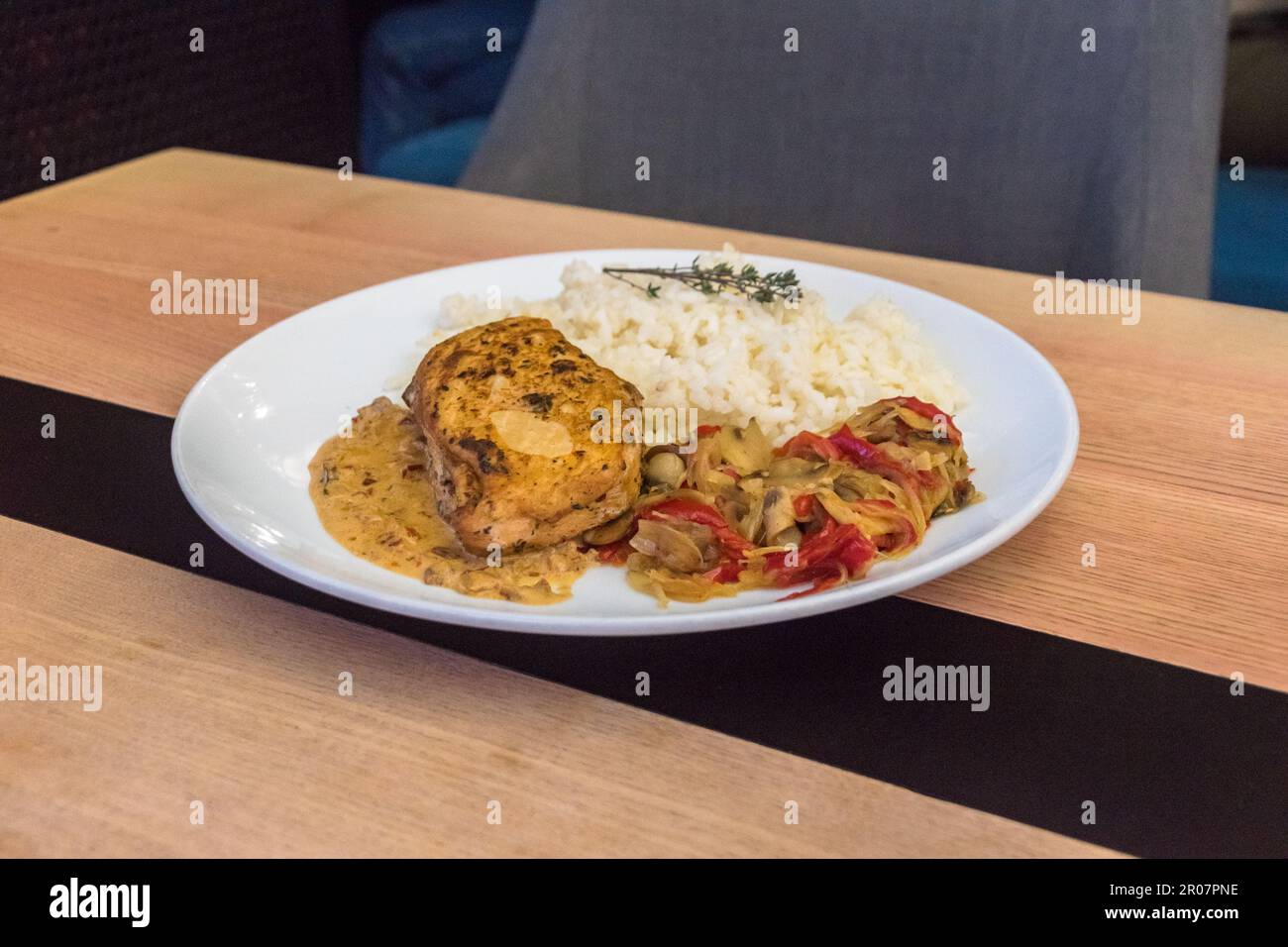 Chicken steak with rice and steamed vegetables Stock Photo - Alamy