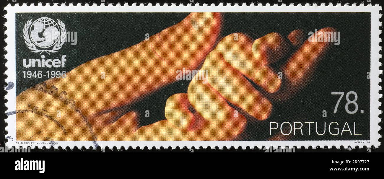 Fiftieth anniversary of Unicef celebrated on postage stamp Stock Photo ...