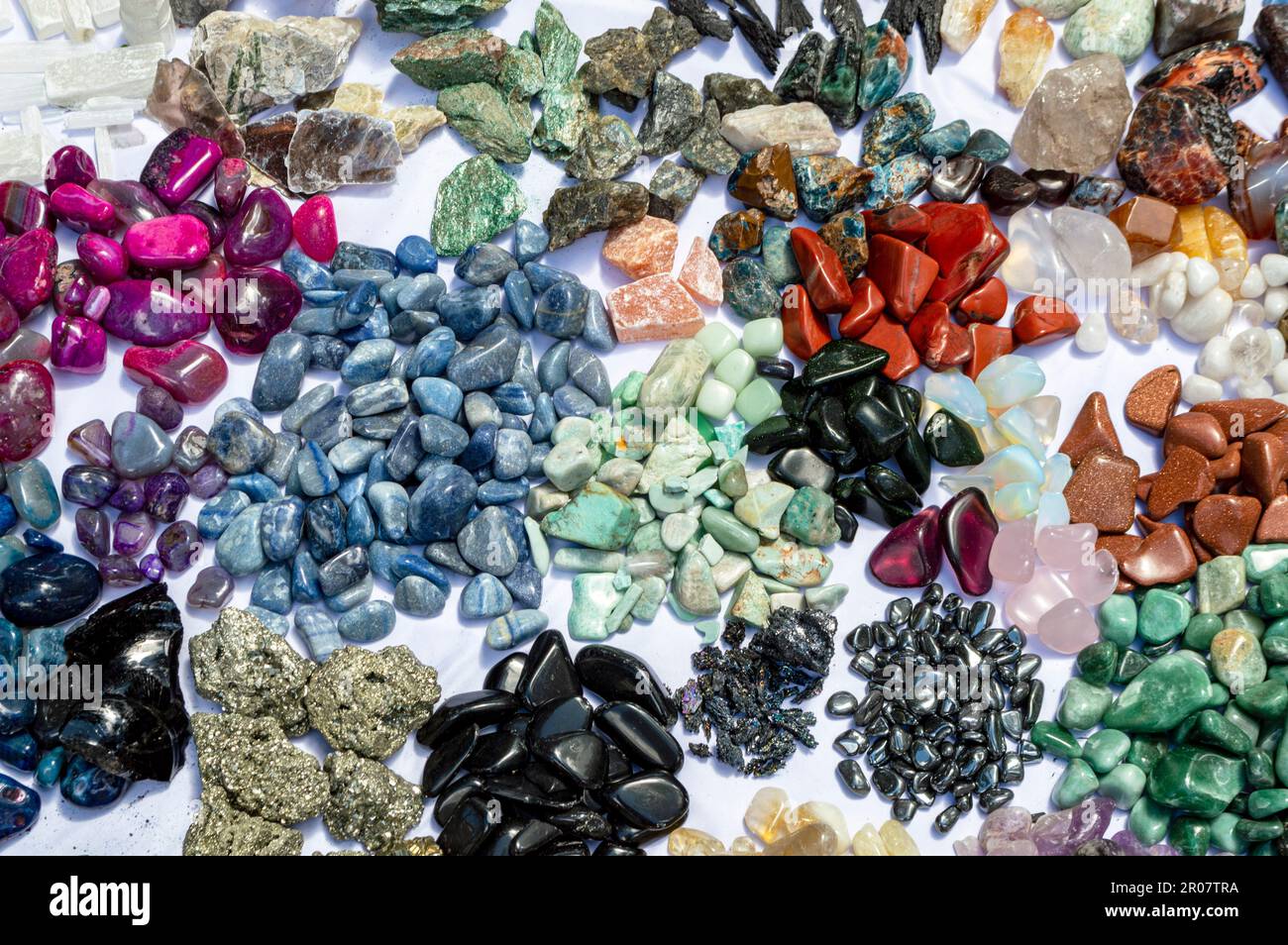 Natural and of little value. Uncut stones of various colors and types ...
