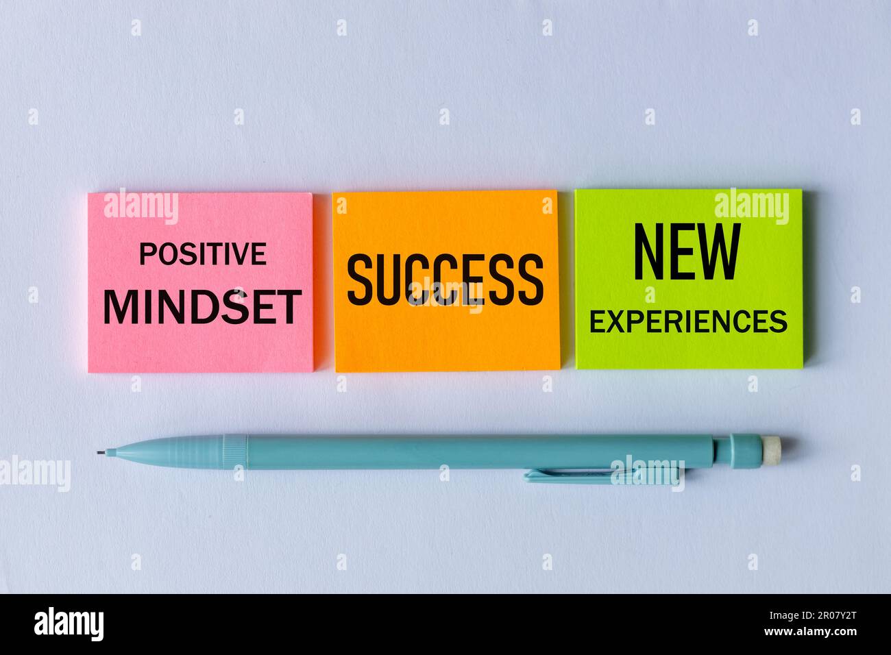 Notes on colorful cards, motivating text, new experiences, positive ...