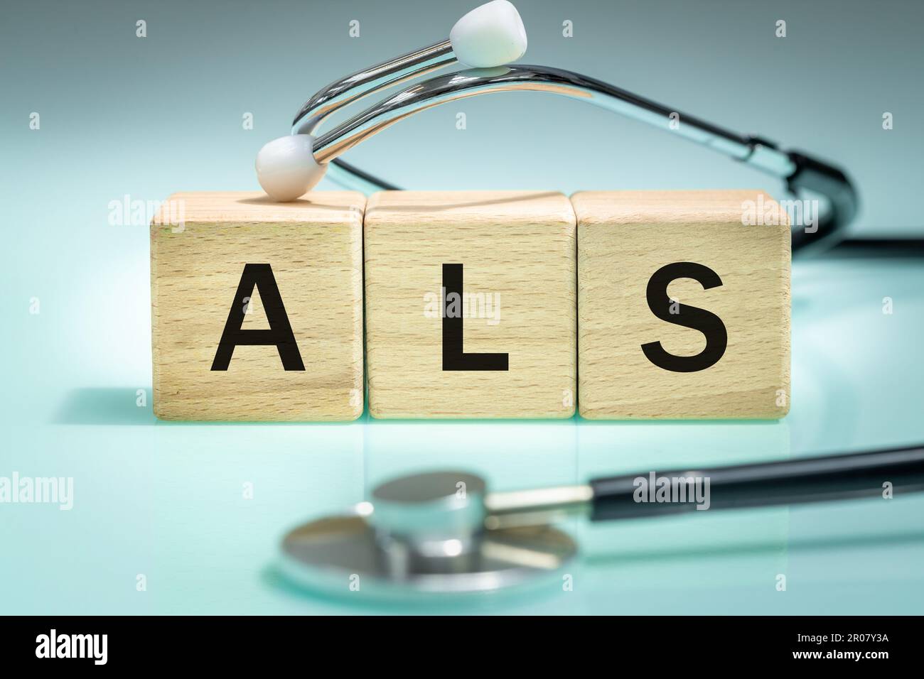 ALS or Written on wooden blocks, Amyotrophic lateral sclerosis, a rare ...