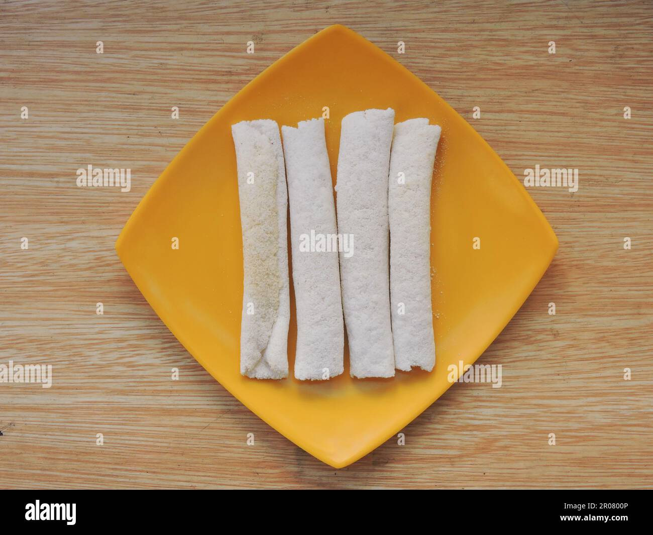 Assamese food known as Pitha prepared during Bihu festival in Assam ...