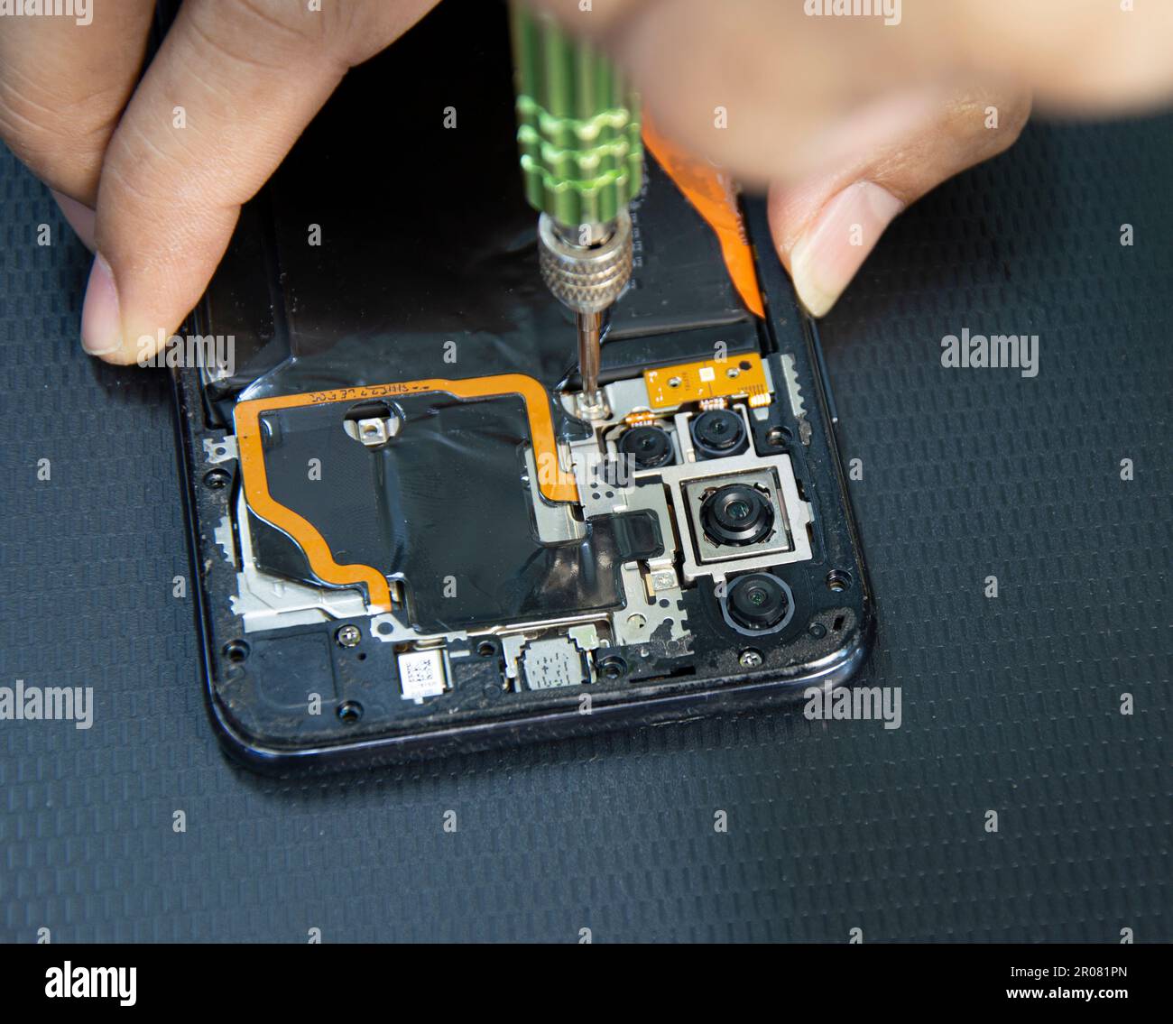 top view, mechanic repairing smartphone Stock Photo - Alamy