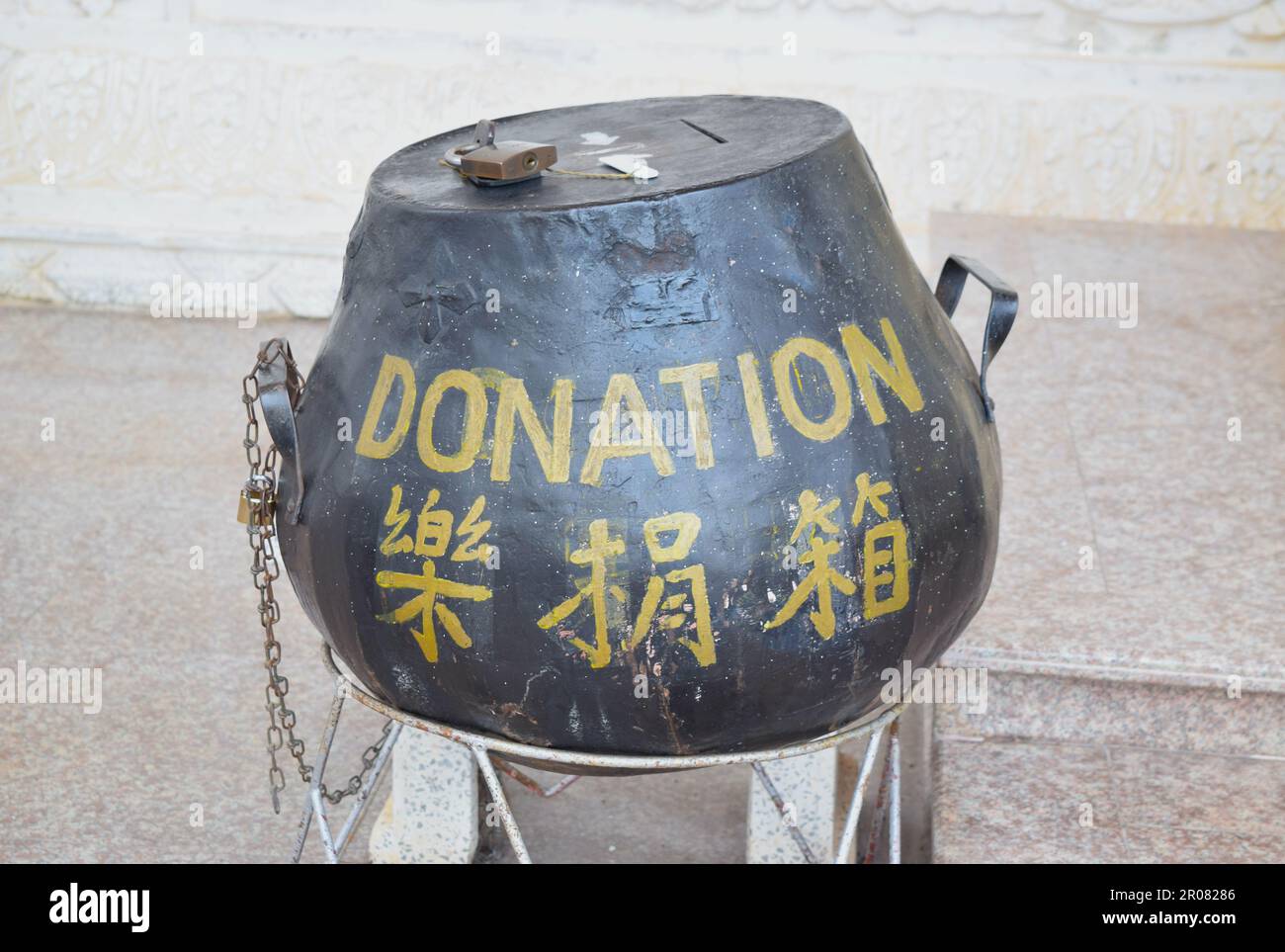 Donation box in Buddhist temple in Hat Yai Stock Photo - Alamy