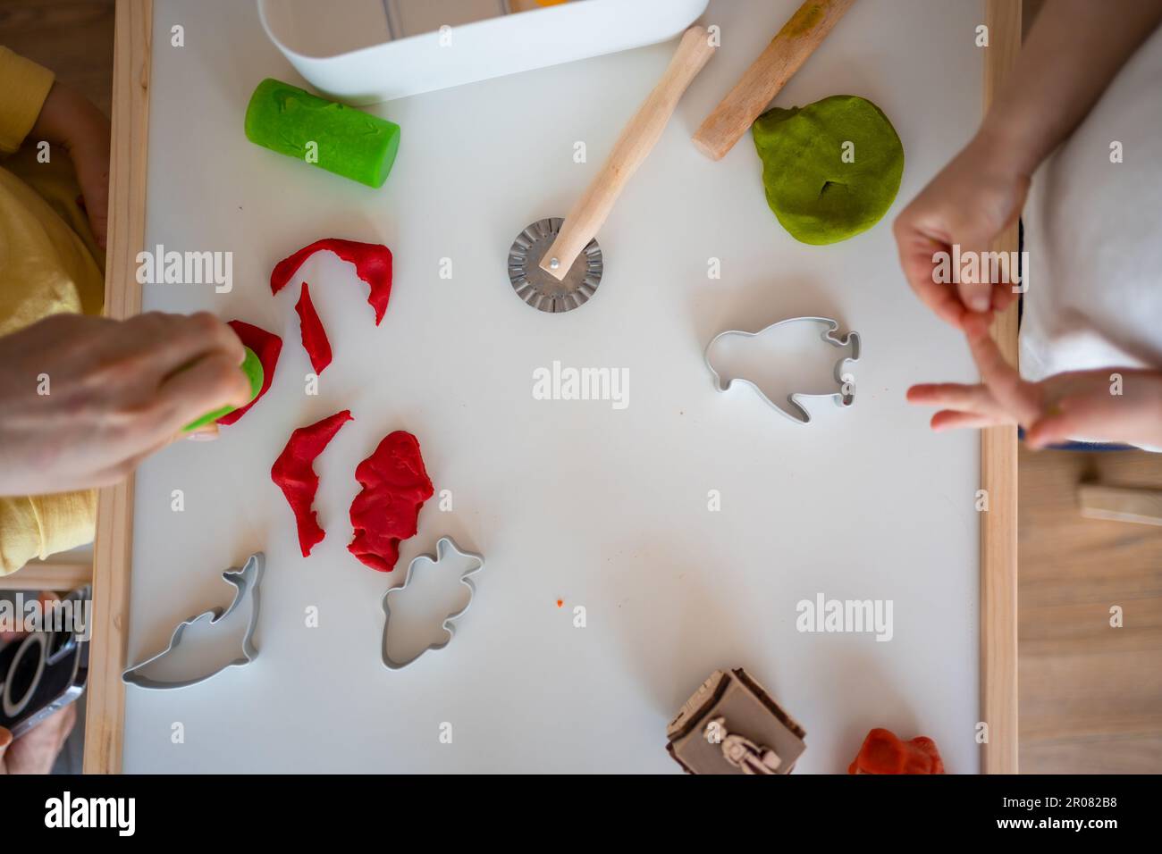 Children playing with plasticine. Sensory development and experiences ...