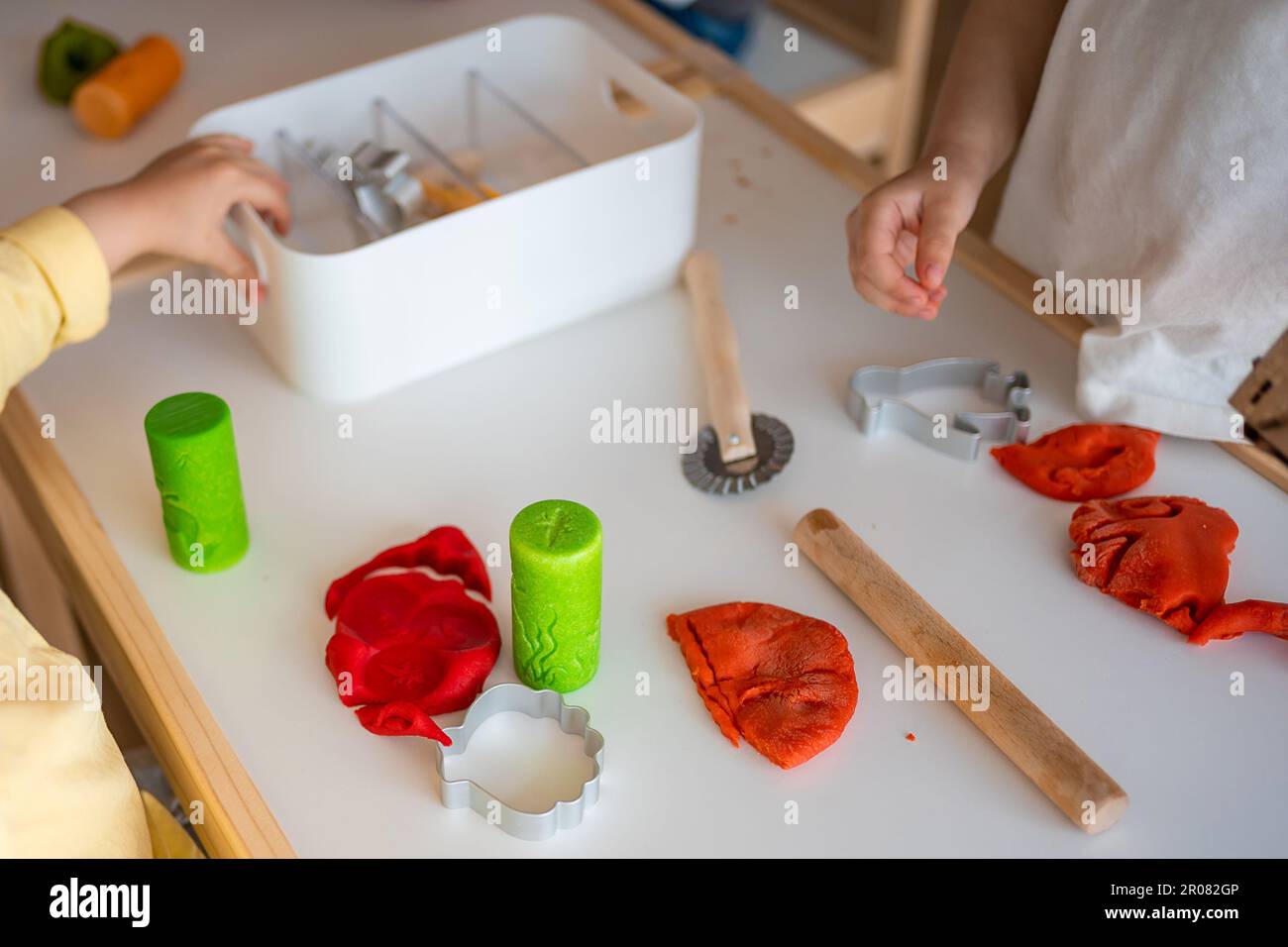 Children playing with plasticine. Sensory development and experiences ...