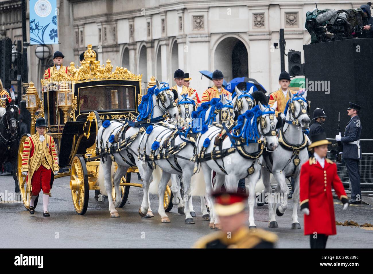 King Charles III and Queen Camilla are carried in the Gold State Coach ...