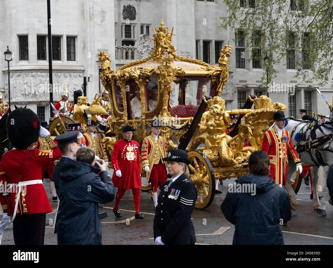 King Charles III and Queen Camilla are carried in the Gold State Coach ...