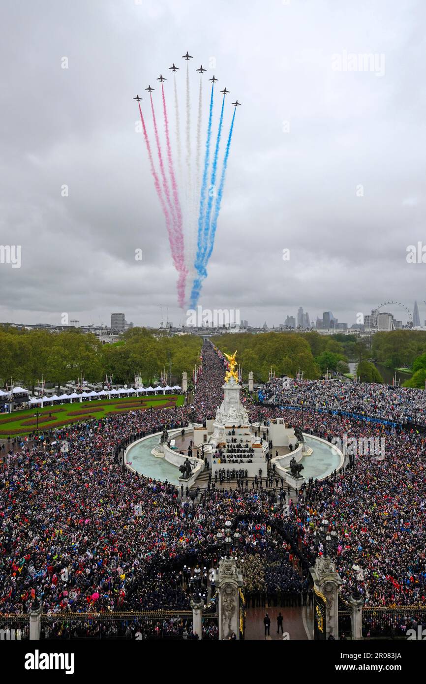 A general view of flypast by aircraft from the Red Arrows over the Mall ...