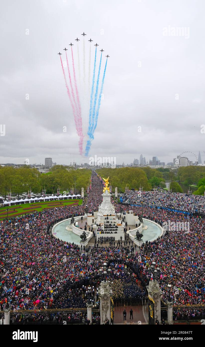 A general view of flypast by aircraft from the Red Arrows over the Mall ...