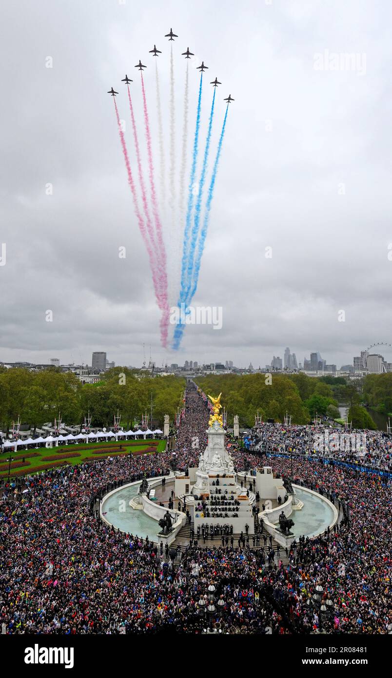 A general view of flypast by aircraft from the Red Arrows over the Mall ...