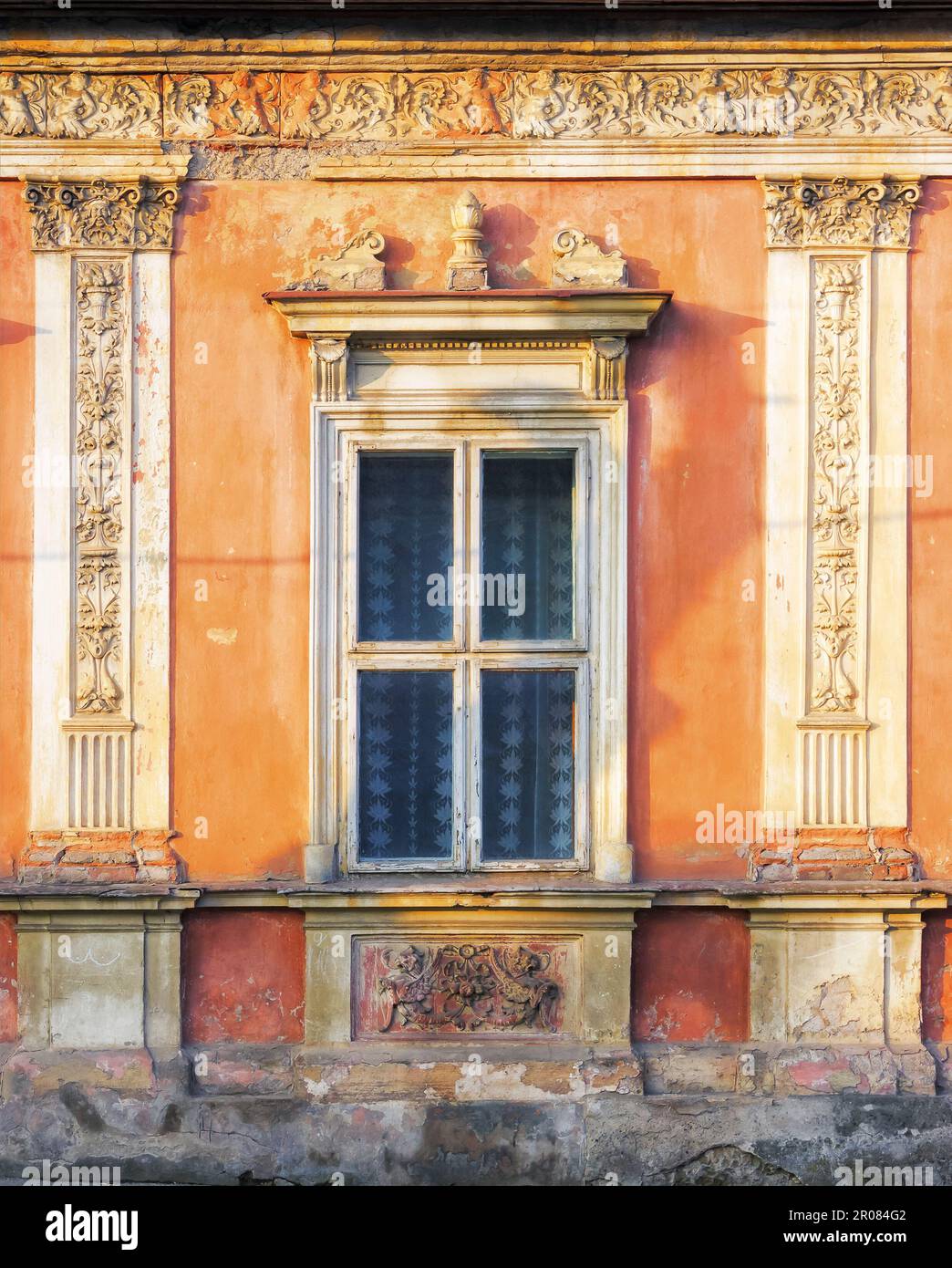 retro windows on the grunge facade. traditional old european ...