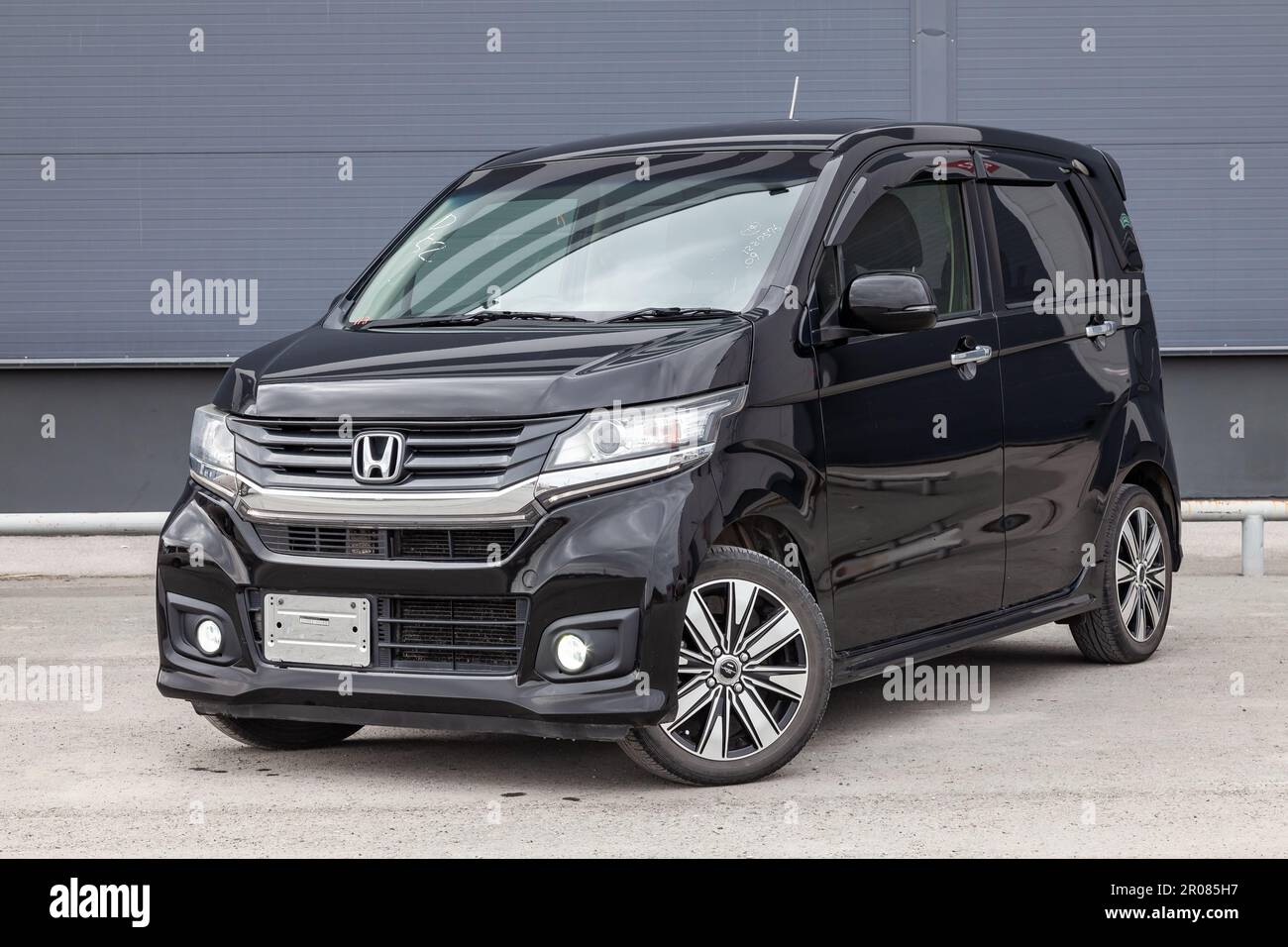 Pavlodar, Kazakhstan - 11.04.2023: Front view of black Honda N-Wgn Custom 700 CC engine is ...