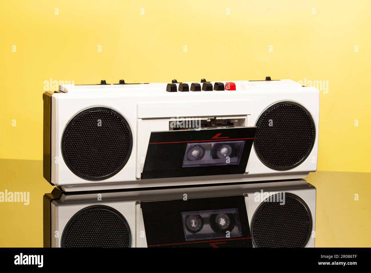 Retro ghetto radio boom box cassette recorder from 80s on a yellow ...