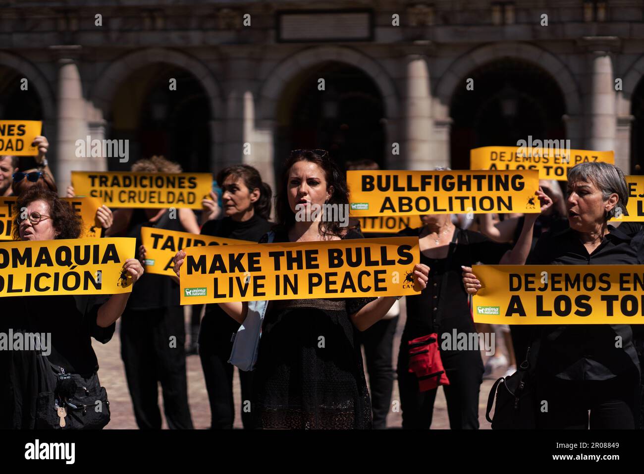 Activists hold placards expressing their opinion during the ...