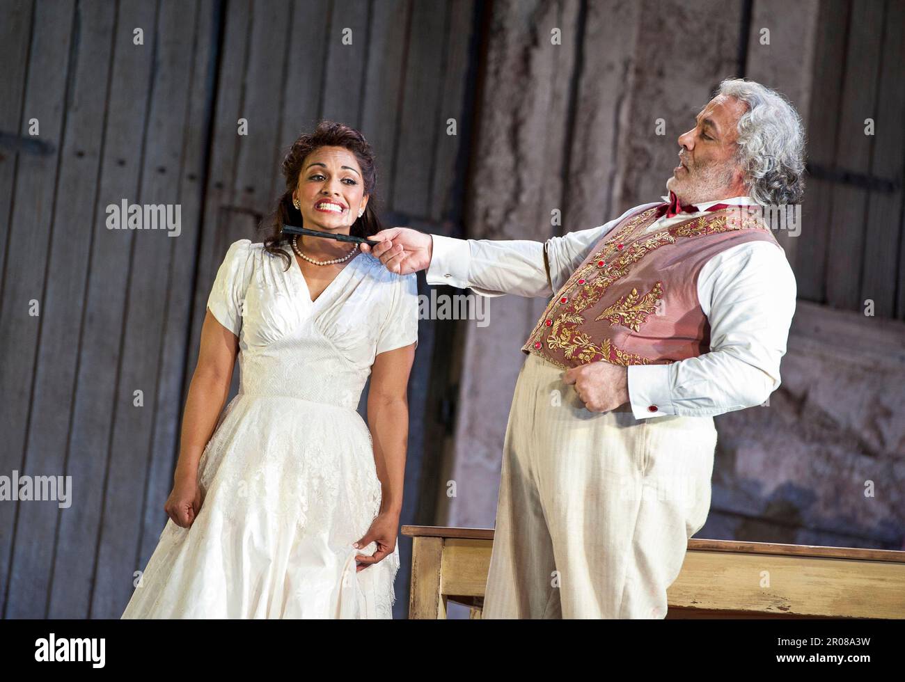 Danielle de Niese (Adina), Paolo Gavanelli (Dr Dulcamara) in L'ELISIR D ...