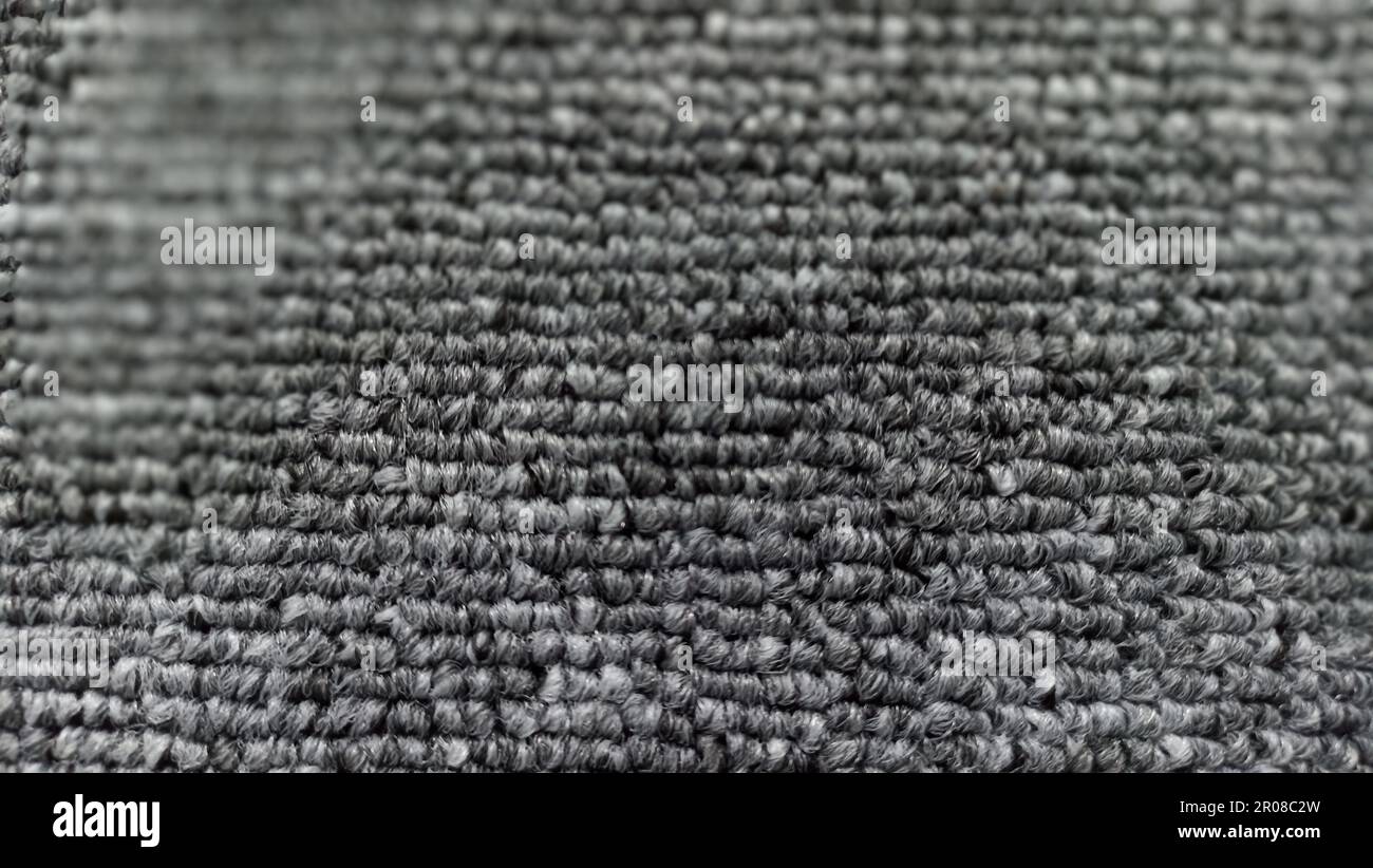 Gray fiber textured carpet background Stock Photo - Alamy