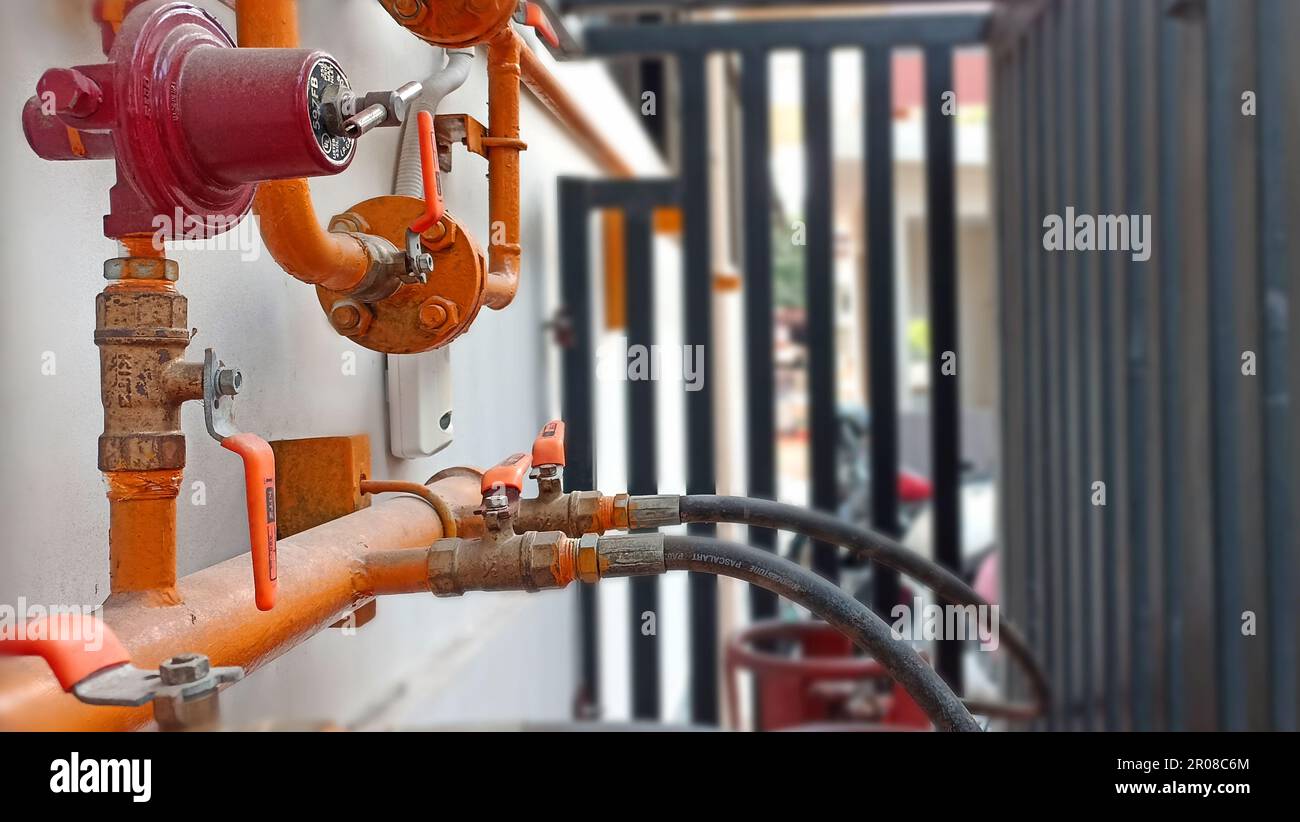 A home gas faucet setting device with a transverse pipe and hose Stock ...