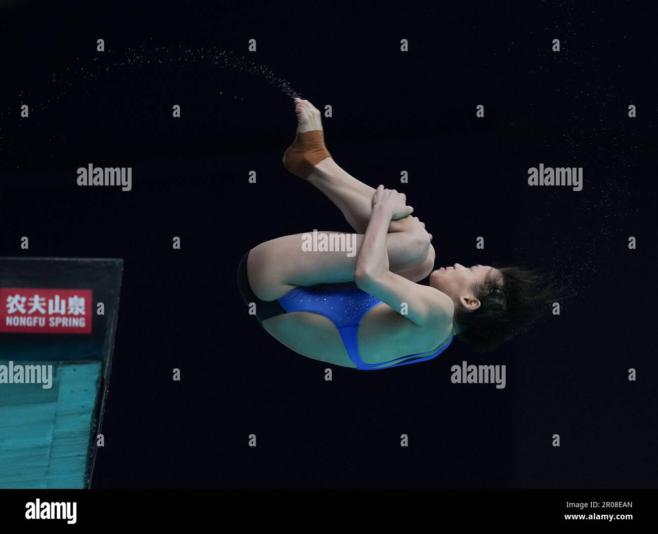 Quan Hongchan, of China, competes during the women's 10-meter platform ...