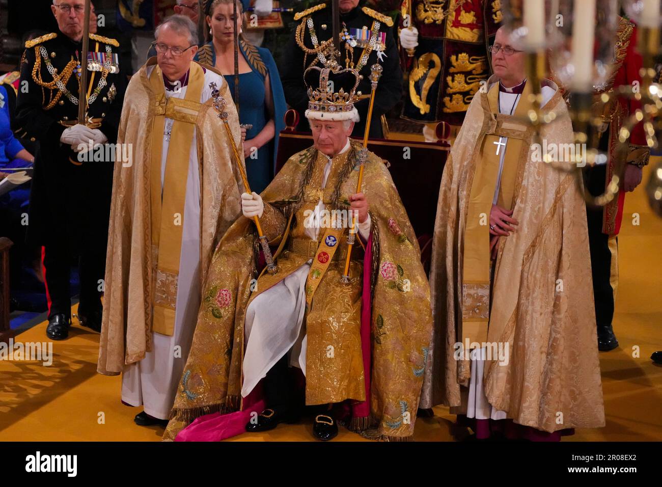 King Charles III (front centre) seated in St Edward's Chair, also known ...