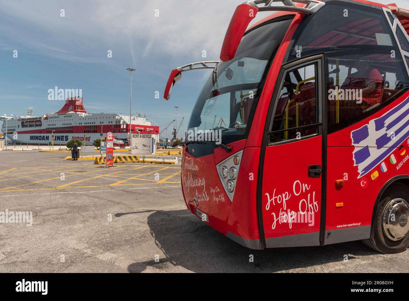 Heraklion port, Crete, Greece, EU. 2023. Red city tour bus at Heraklion ...
