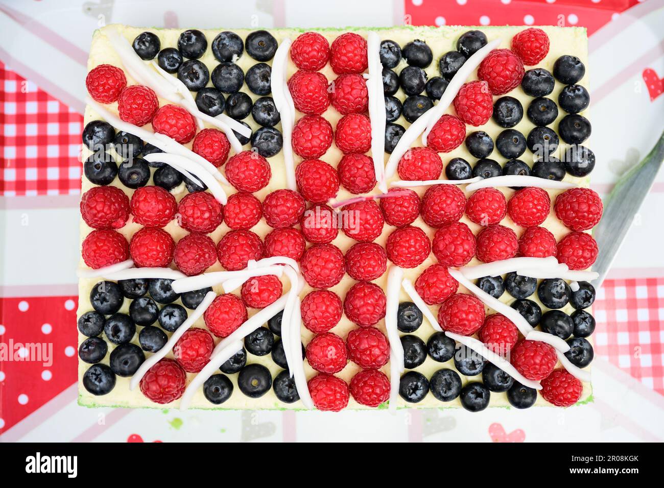 Coronation-themed cakes are laid out for serving, during a visit by the ...
