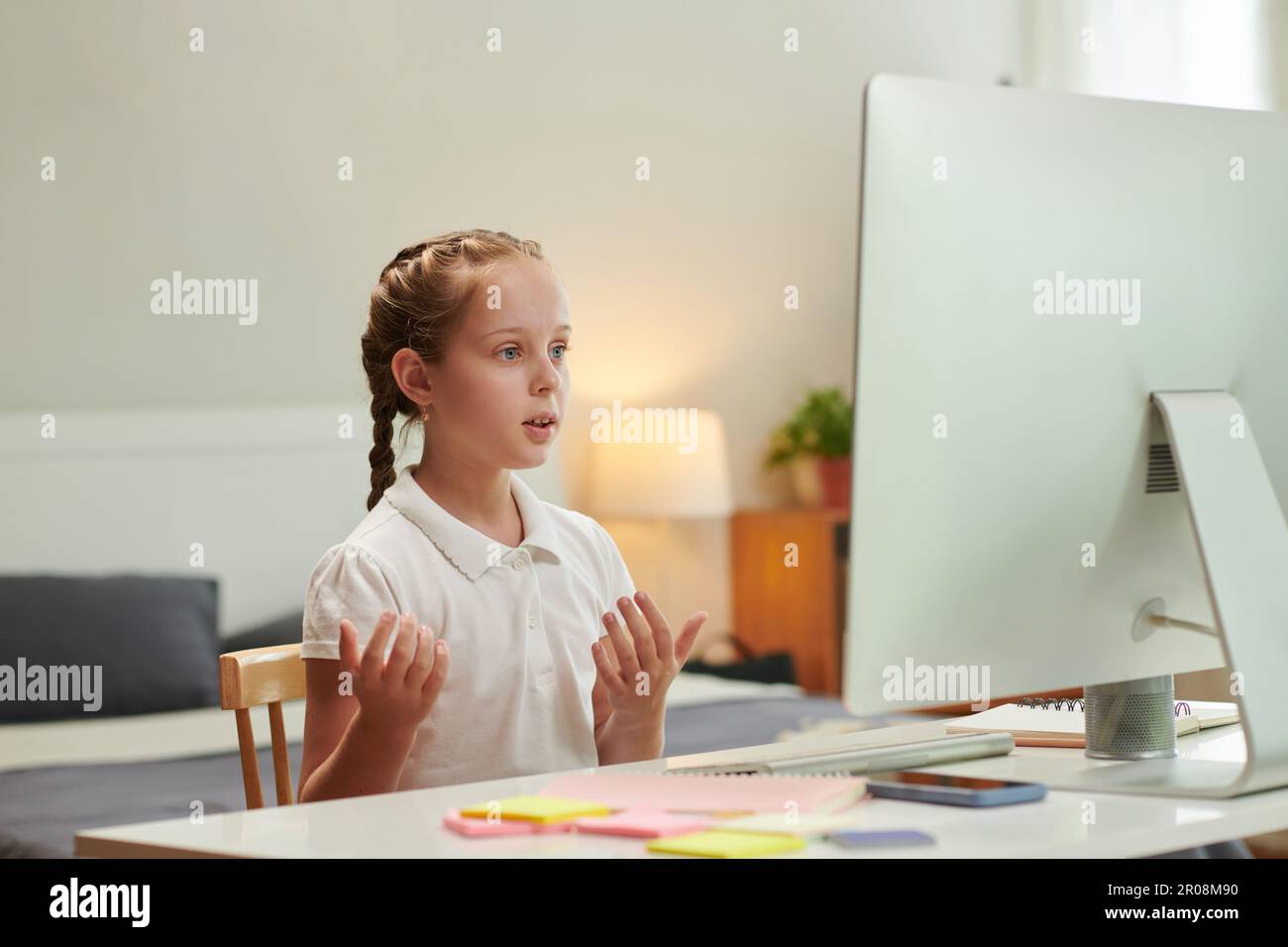 Schoolgirl in front laptop hi-res stock photography and images - Alamy
