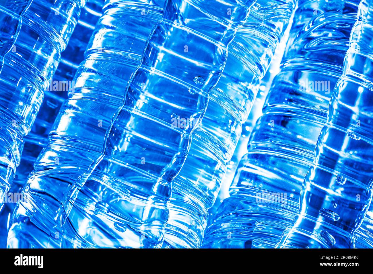 abstract close up pile of plastic water bottles Stock Photo - Alamy