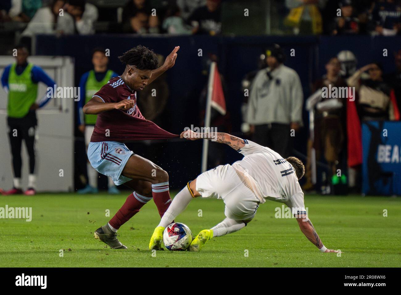 Colorado Rapids midfielder Ralph Priso (97) is fouled by Los Angeles ...