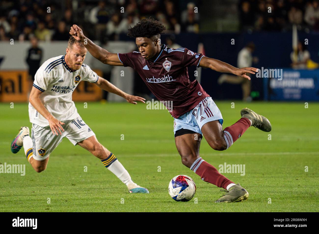 Colorado Rapids midfielder Ralph Priso (97) is defended by Los Angeles ...