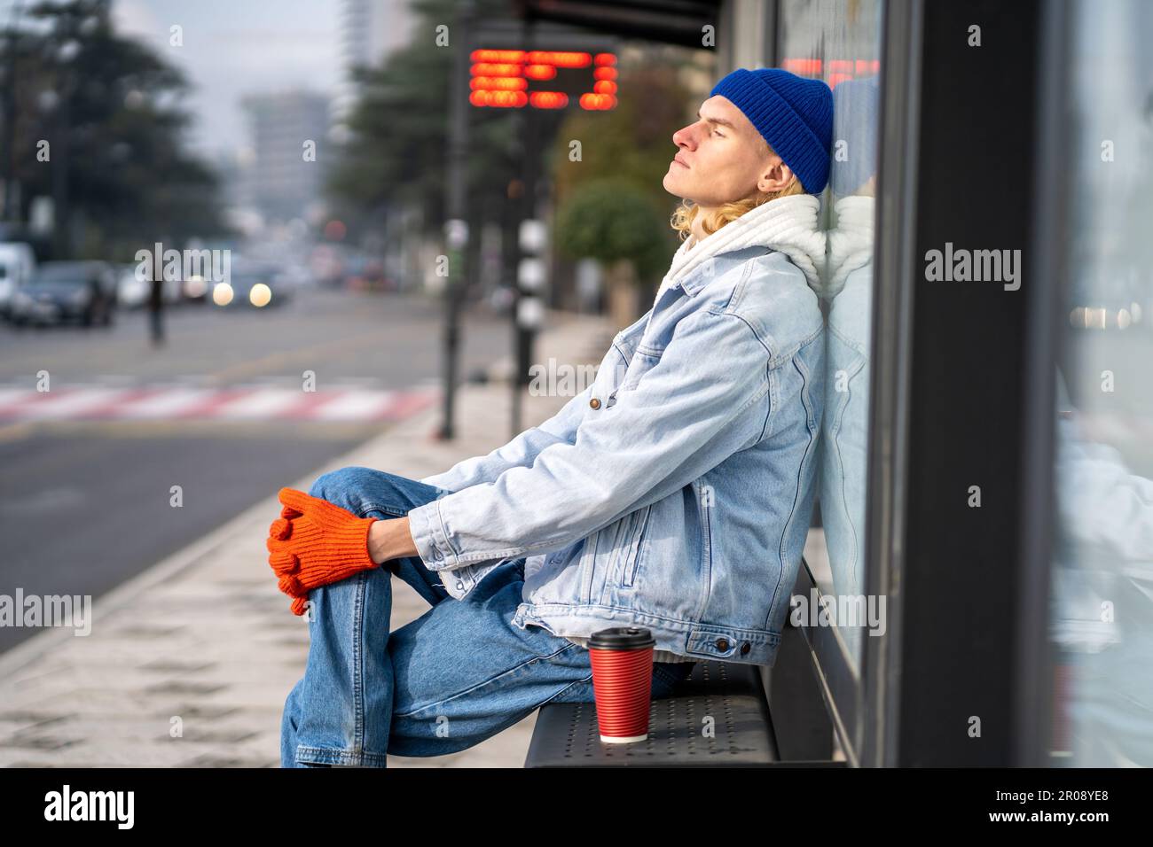 Bus stop bored hi-res stock photography and images - Alamy