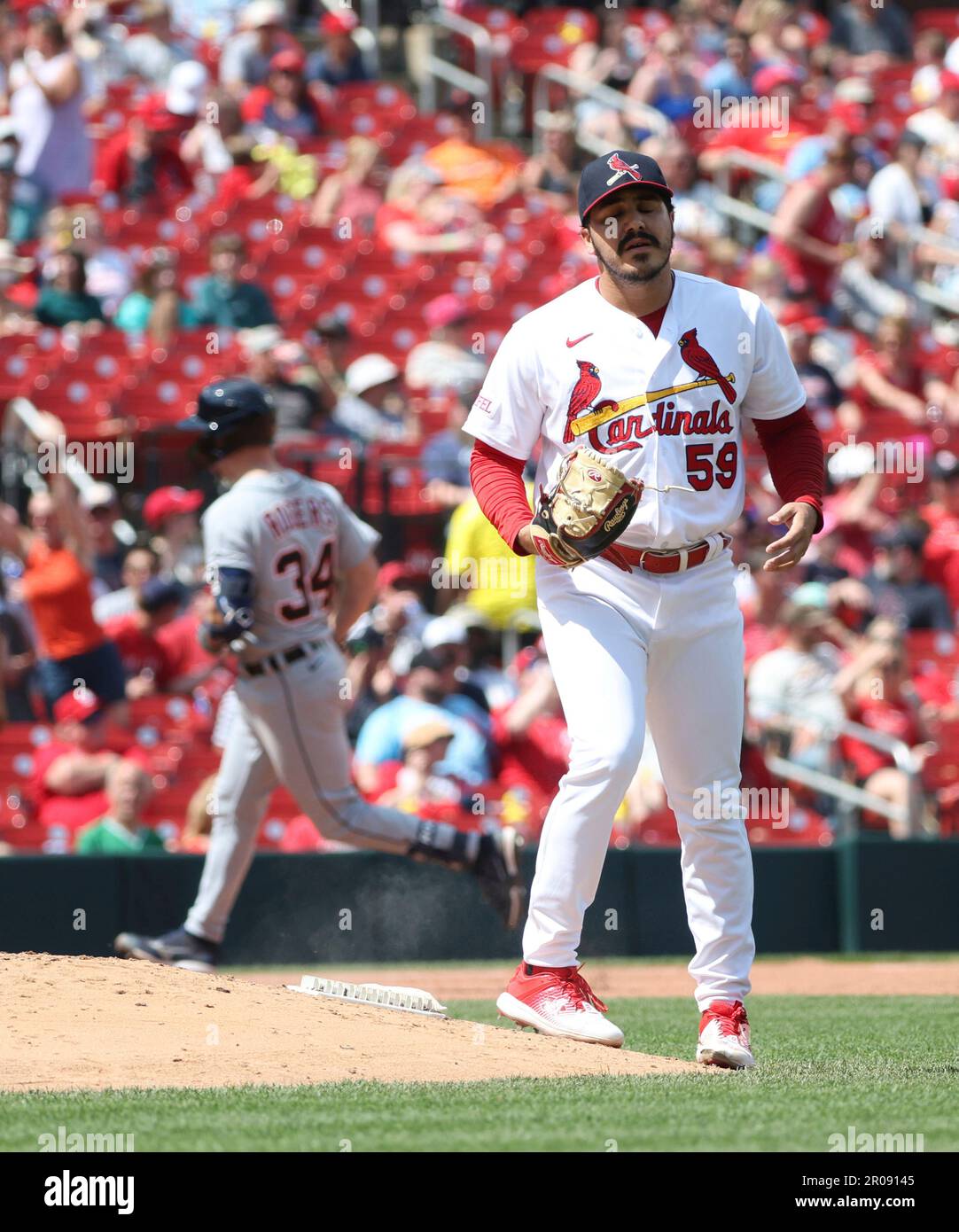 St. Louis Cardinals relief pitcher JoJo Romero (59) regroups as Detroit Tigers' Jake Rogers (34 ...