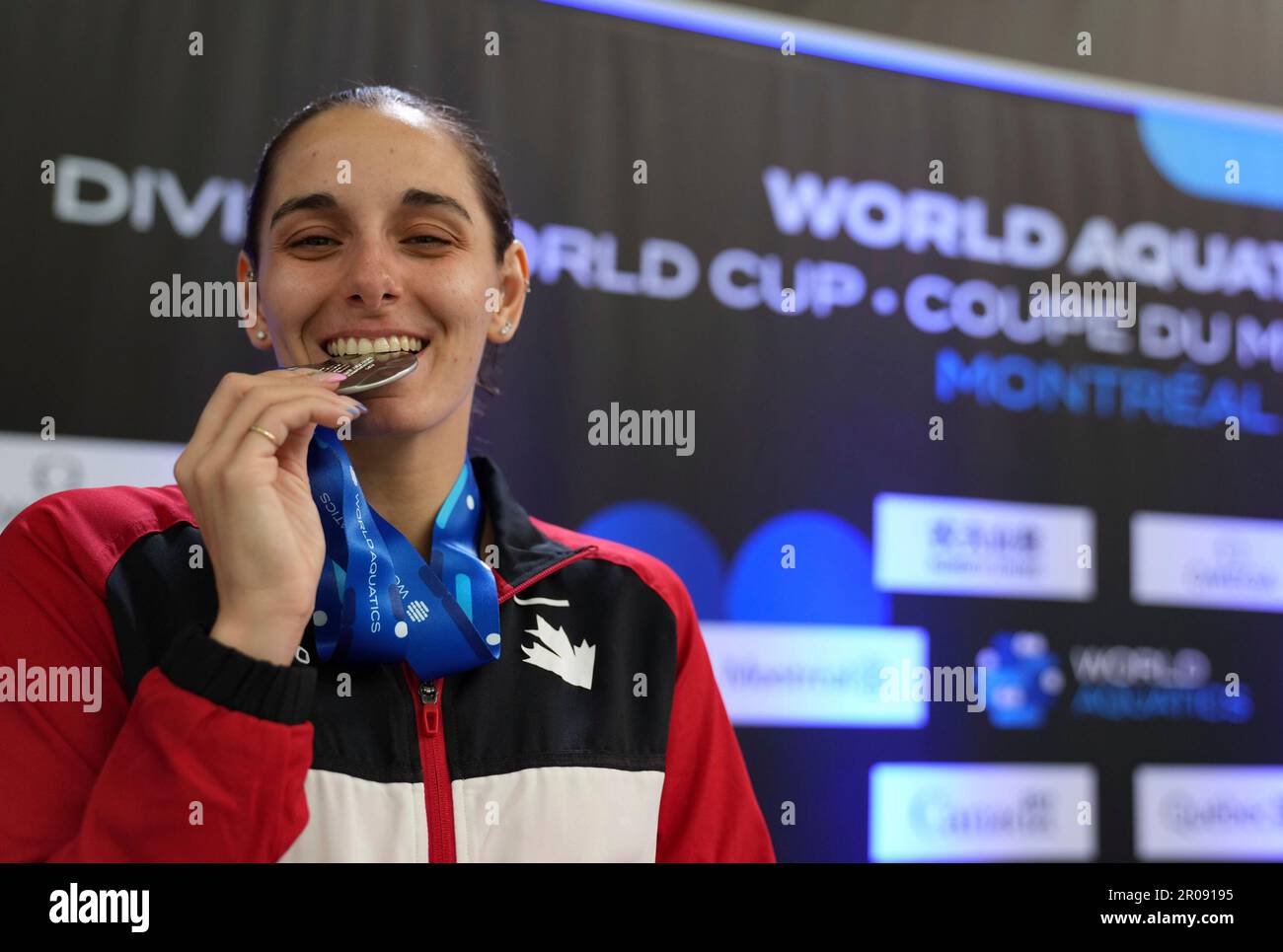 Pamela Ware, of Canada, poses with her silver medal following the women ...