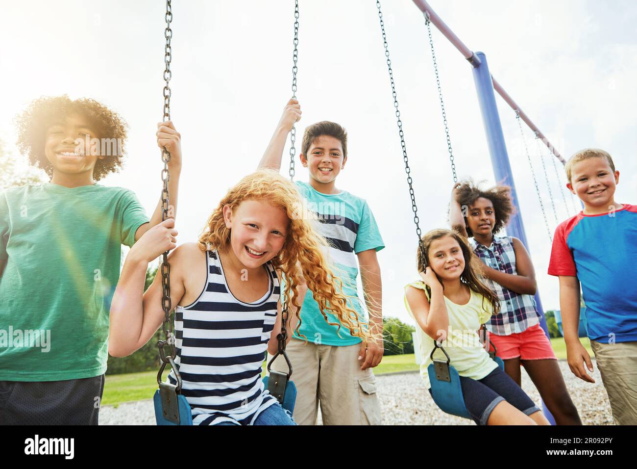 Welcome to our favourite hangout. Portrait of a group of young children ...