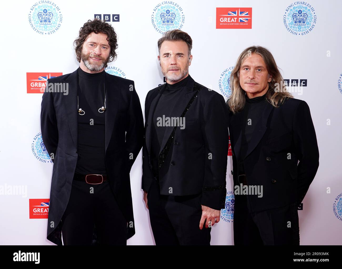 Members of Take That (left to right) Howard Donald, Gary Barlow and Mark Owen backstage at the ...