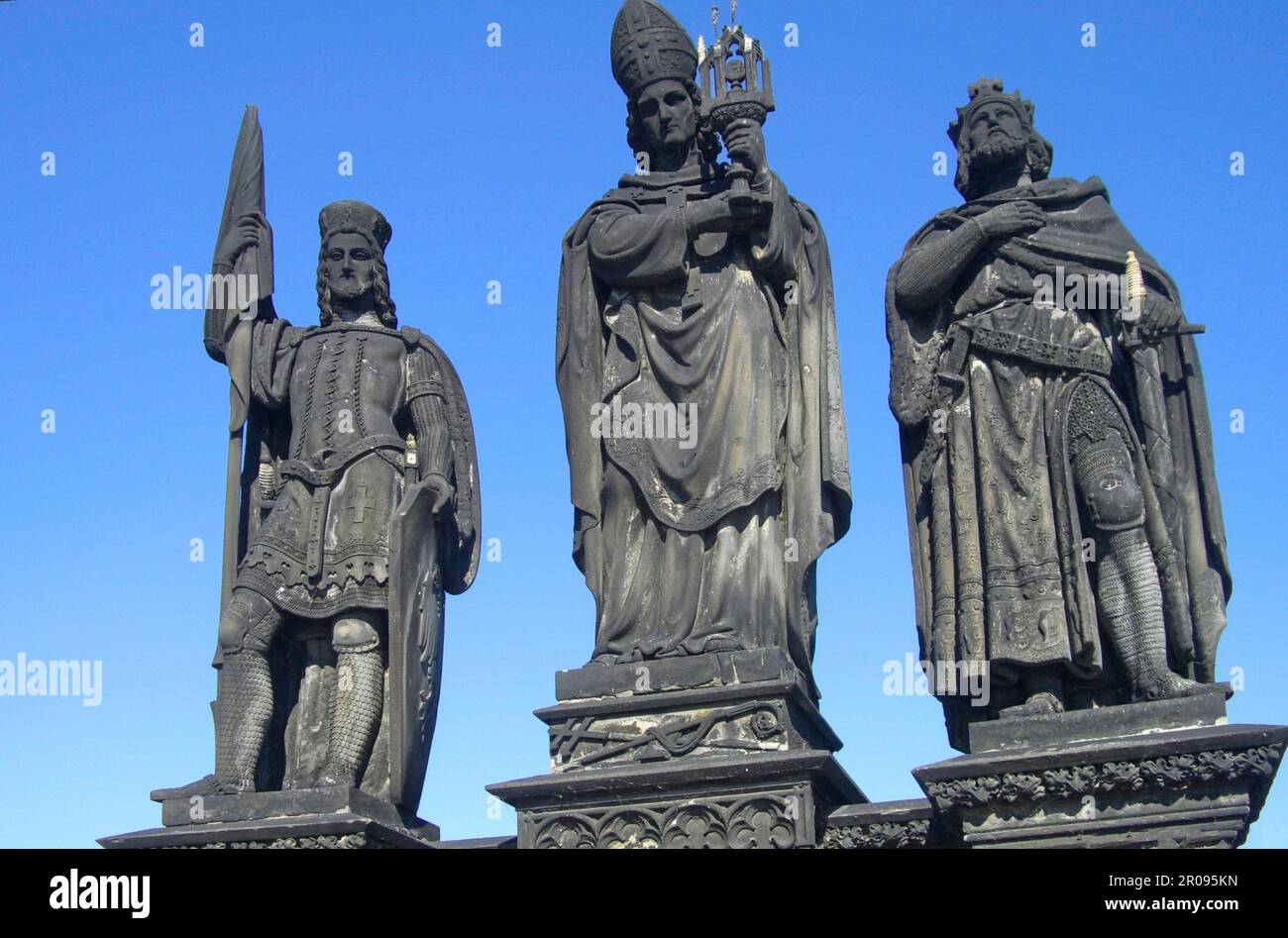 The striking statues adorning Charles Bridge the medieval stone arch ...