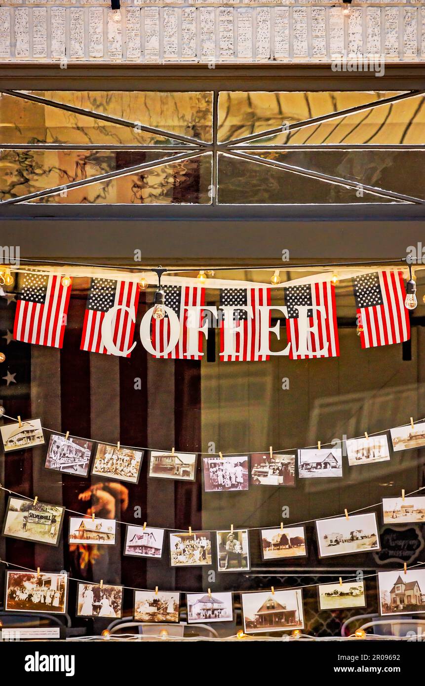 Historic photos hang in the window of Brodie’s Cream & Bean, located in ...