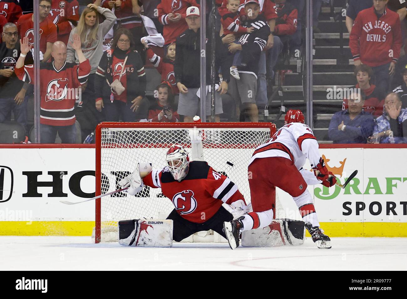 Carolina Hurricanes left wing Jordan Martinook, right, scores a penalty ...