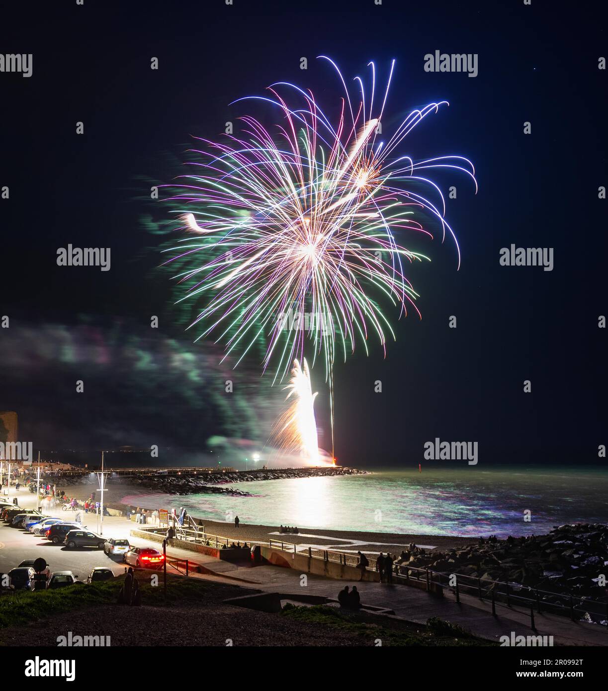 West Bay, Dorset, UK. 7th May 2023. A spectacular fireworks display at West Bay in Dorset during ...